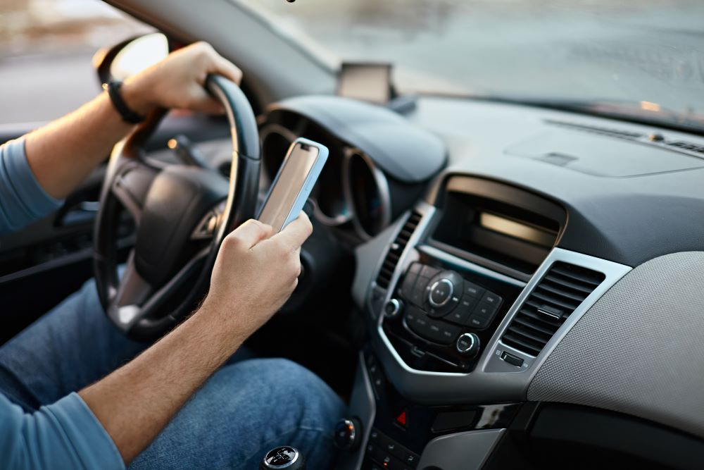 Understanding Legal Responsibility in Distracted Driving Accidents ...